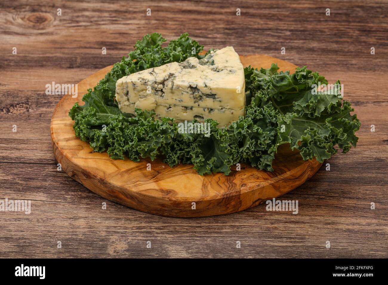 Dairy Blue cheese triangle with mold Stock Photo - Alamy