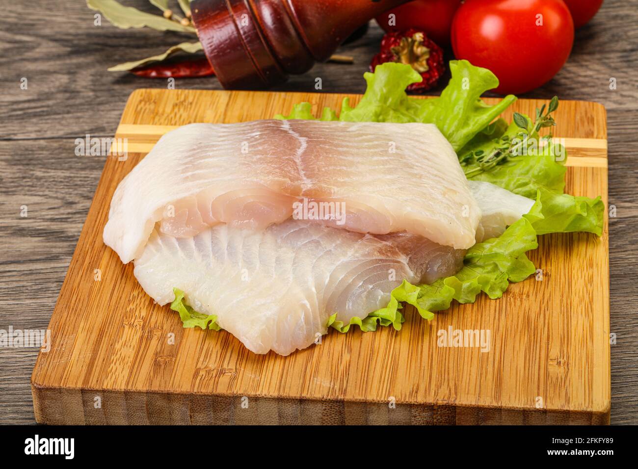 Raw pangasius fillet fish for cooking Stock Photo - Alamy