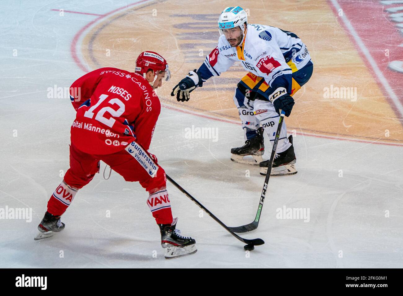 # 12 Steve Moses (Lakers) against Raphael Diaz # 16 (EV Zug) during the ...