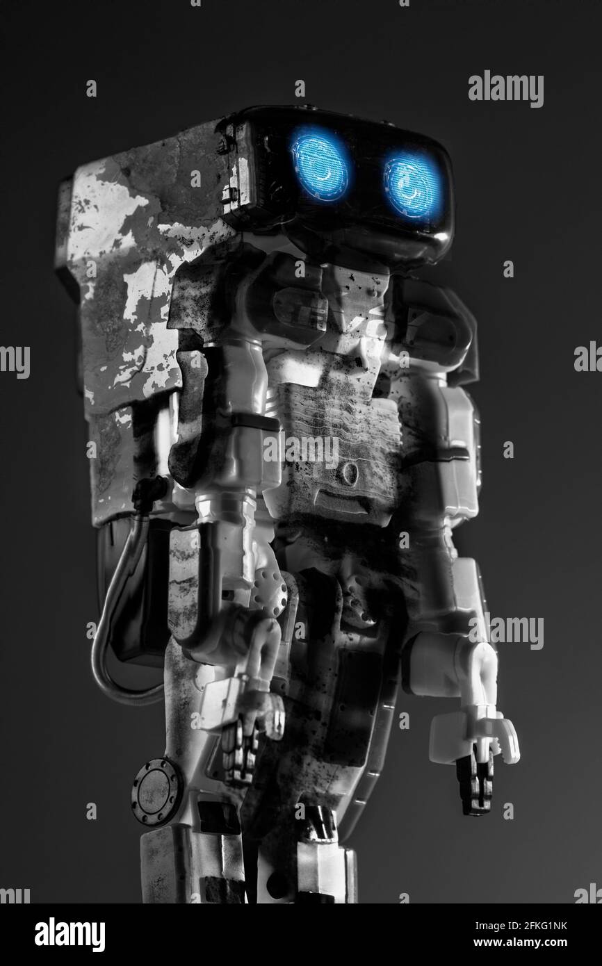 Rusted effects on a modern advanced autonomous robot toy isolated on a ...