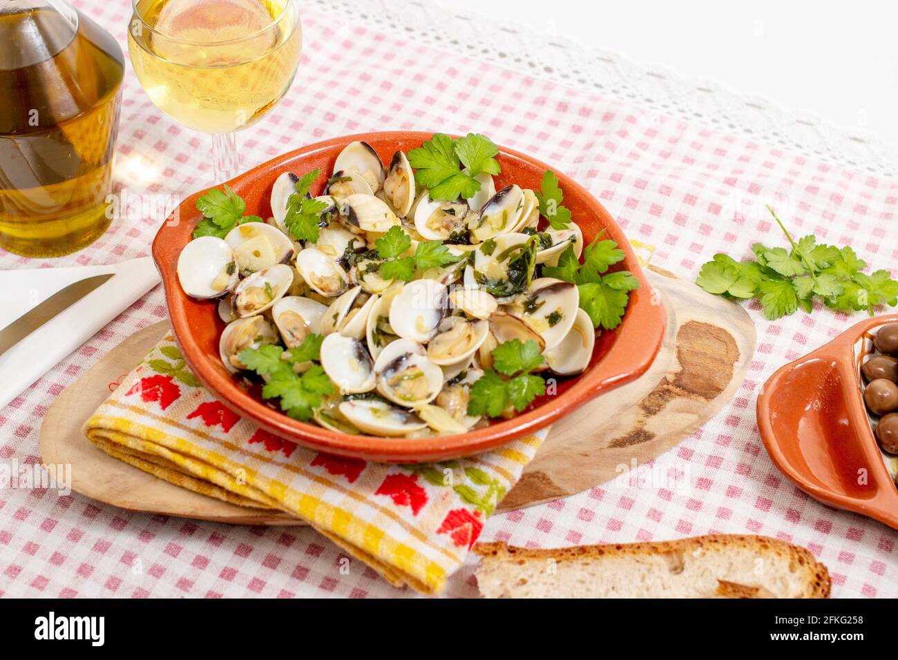 Typical starter portuguese meal of clams with garlic, olive oil and ...