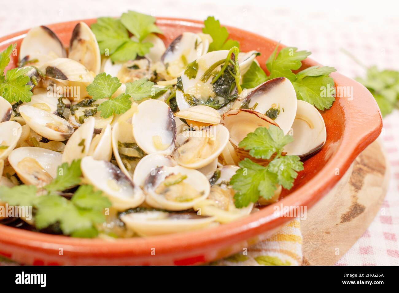 Typical starter portuguese meal of clams with garlic, olive oil and ...