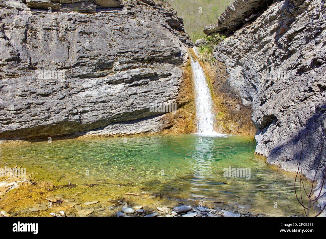 Beautiful shot of a waterfall between cliffs Stock Photo - Alamy