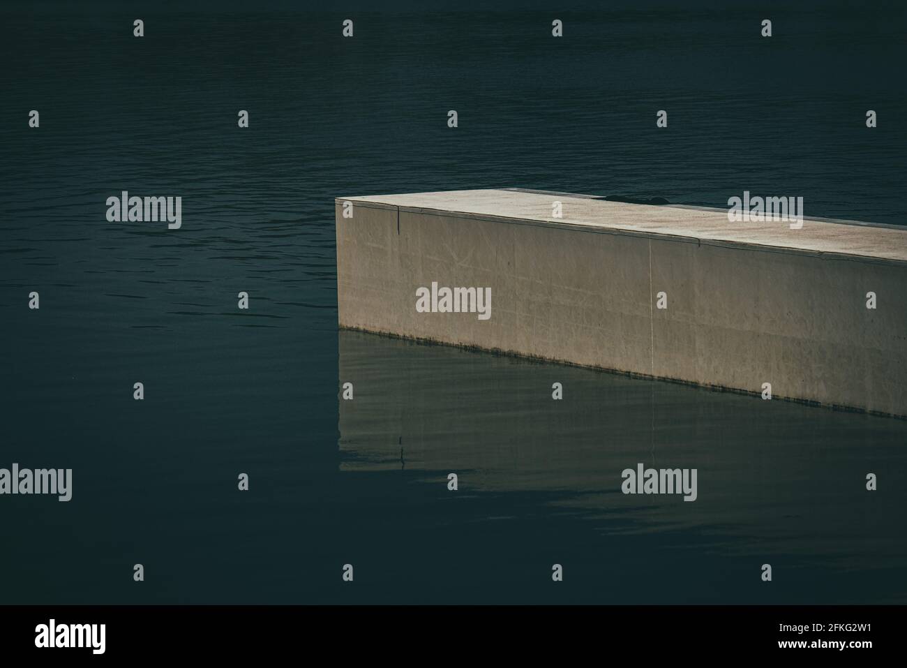 Reflection of light on water near a tiled wall outdoors Stock Photo - Alamy