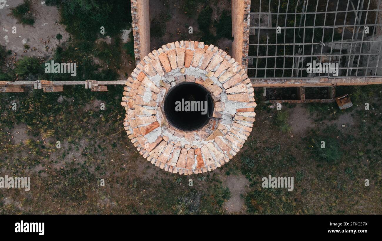Top view of a round stone chimney Stock Photo - Alamy