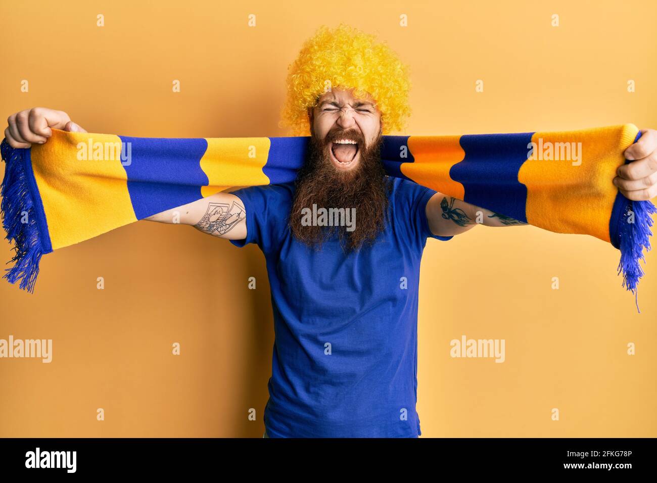 Redhead man with long beard football hooligan cheering game wearing ...