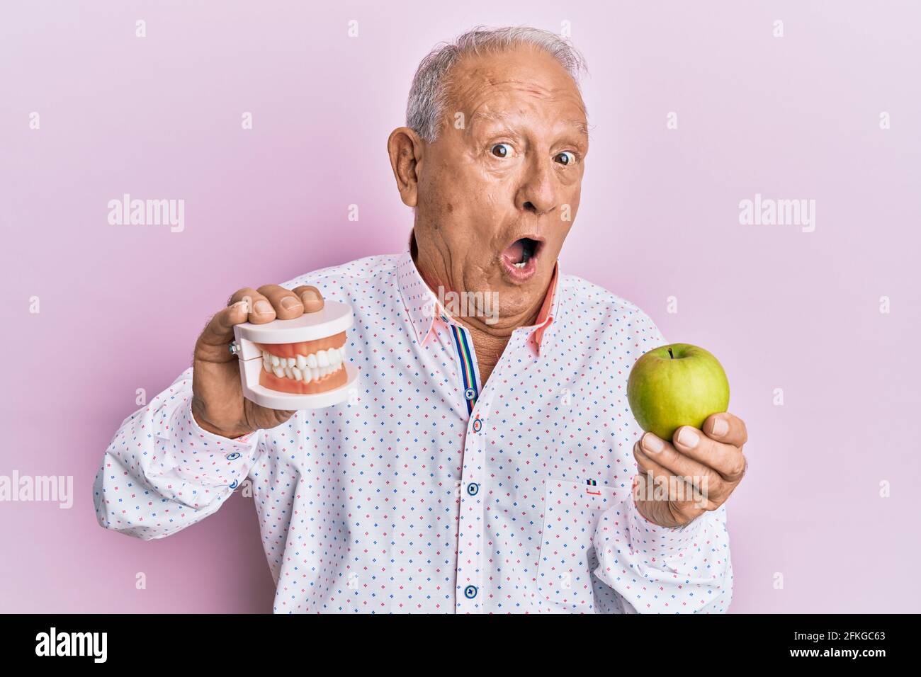 Portrait man apple in mouth hi-res stock photography and images - Alamy
