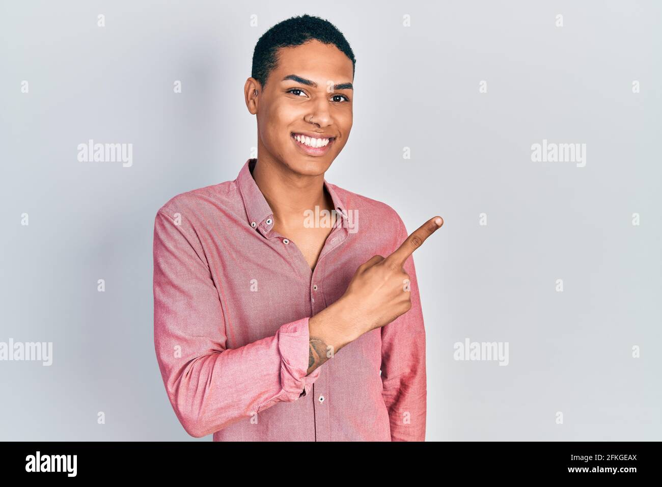 Young african american guy wearing casual clothes smiling happy ...