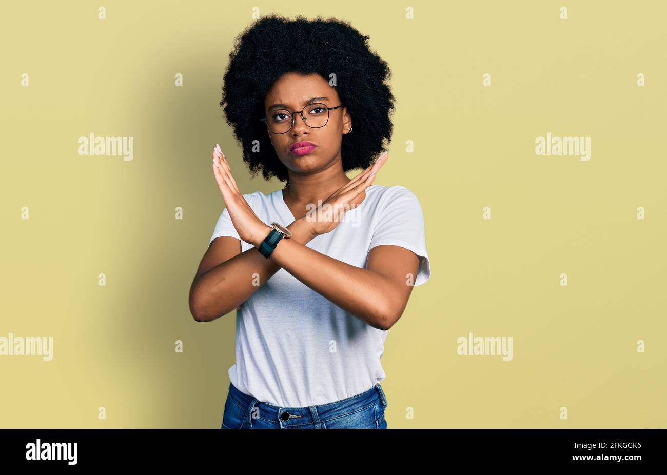 Young african american woman wearing casual white t shirt rejection ...