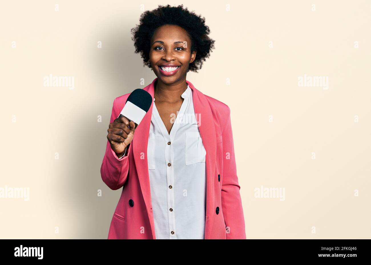 Standing communication reporter holding microphone hi-res stock ...