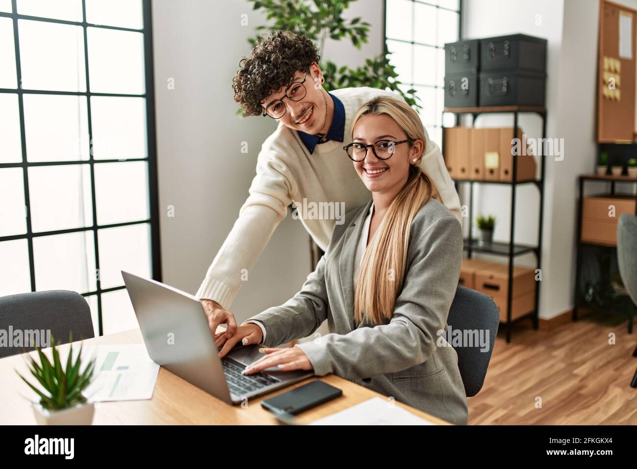 Two business executives working at the office Stock Photo - Alamy