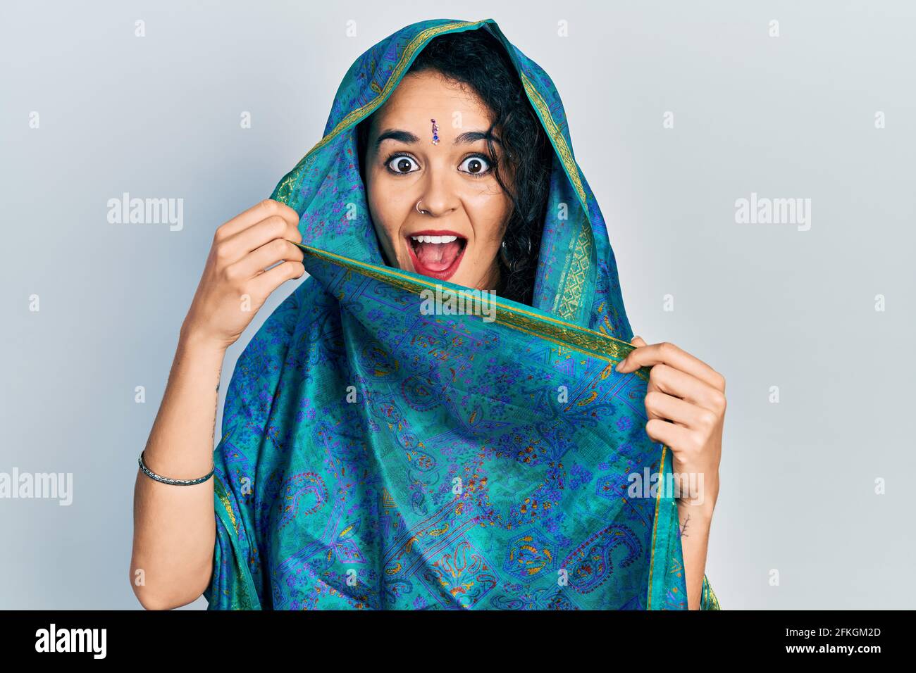 Young woman wearing bindi wearing traditional indian saree looking to ...