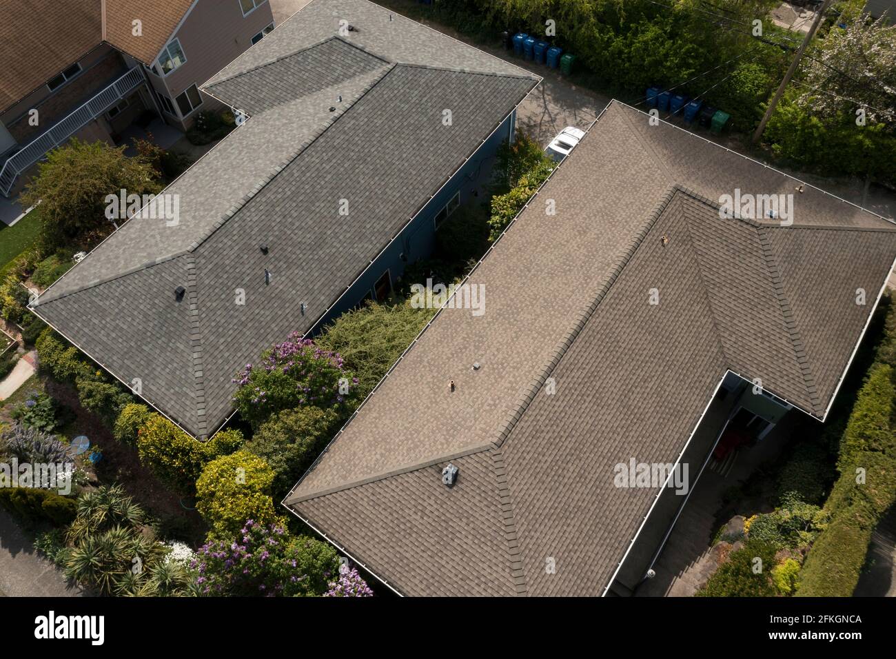Aerial view of two triplex apartment buildings in West Seattle's Alaska ...