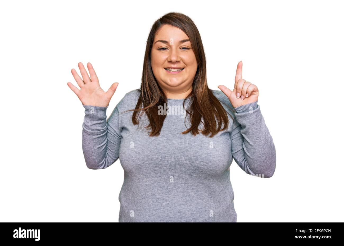 Beautiful Brunette Plus Size Woman Wearing Casual Clothes Showing And