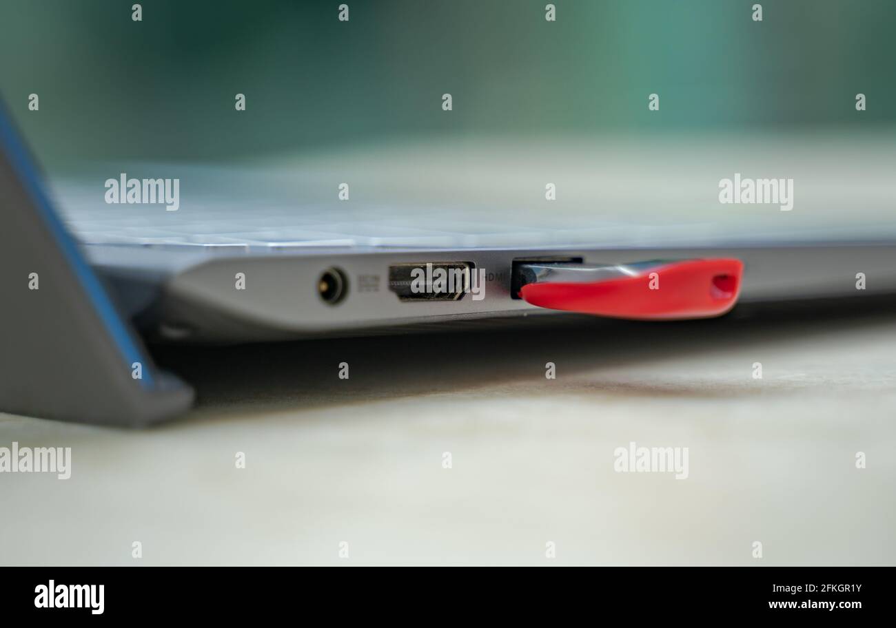 USB flash drive plugged in the laptop. pen drive Stock Photo - Alamy