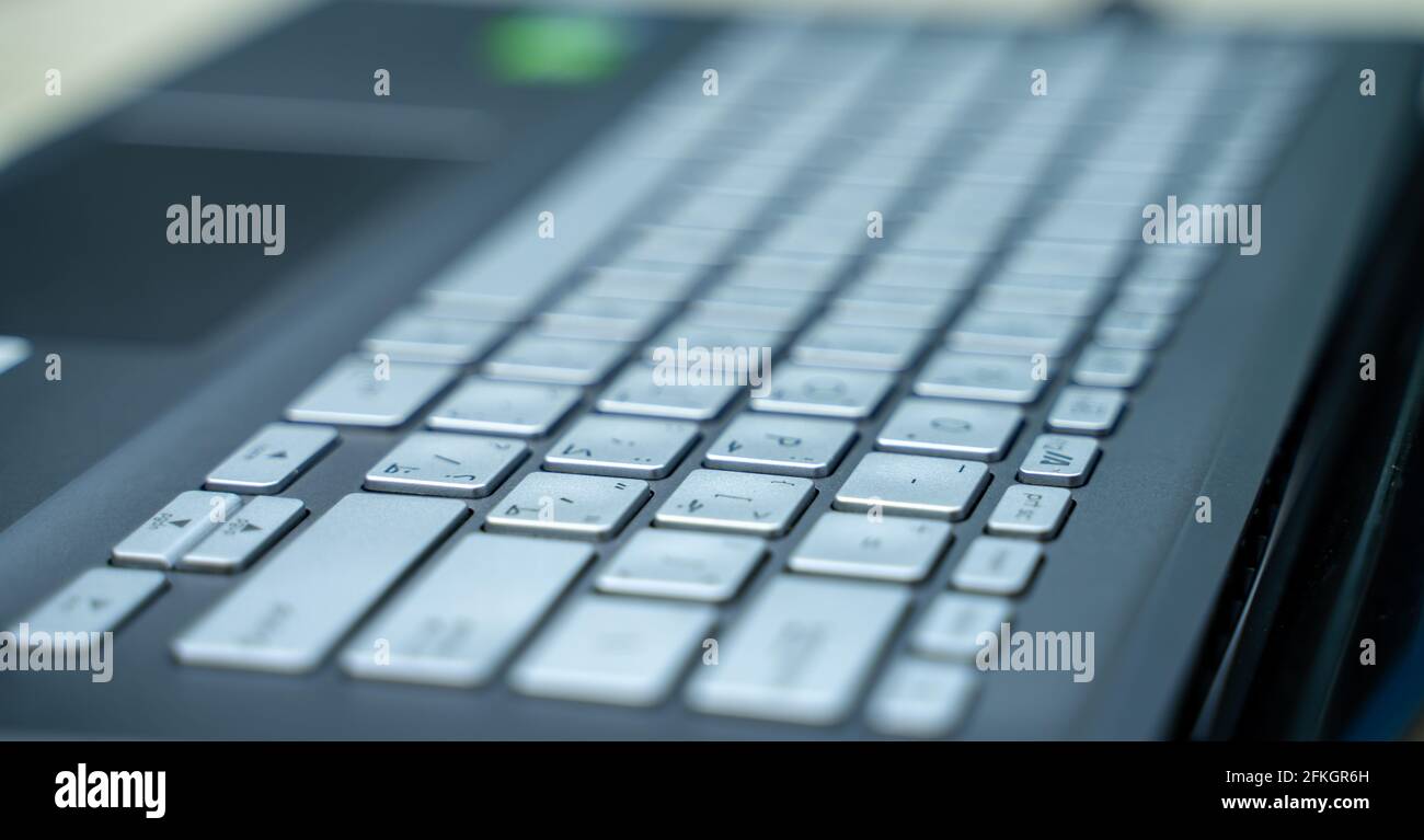 close up shot of laptop keyboard. working Stock Photo - Alamy