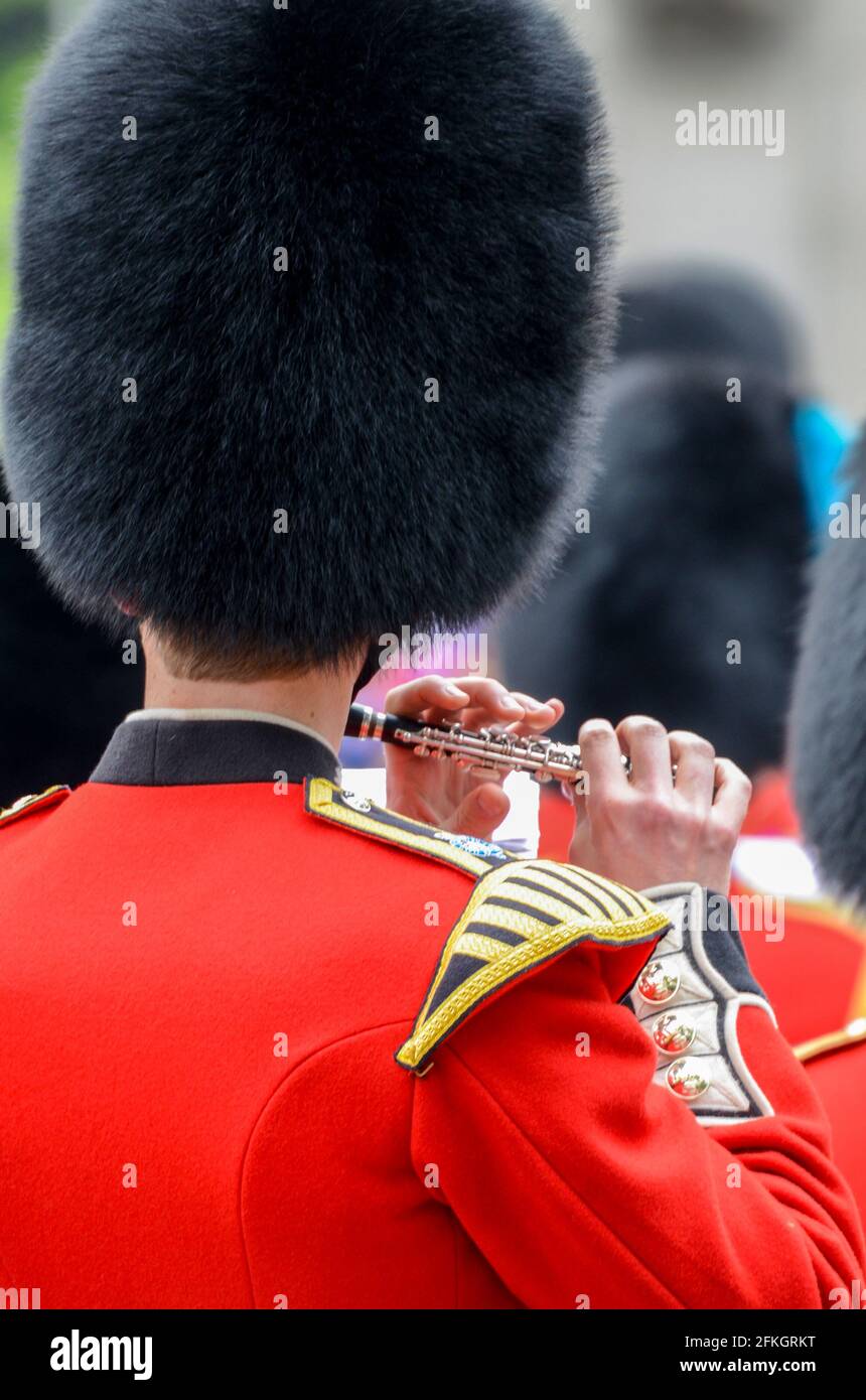 Soldier of the Band of the Scots Guards playing a flute or piccolo in ...