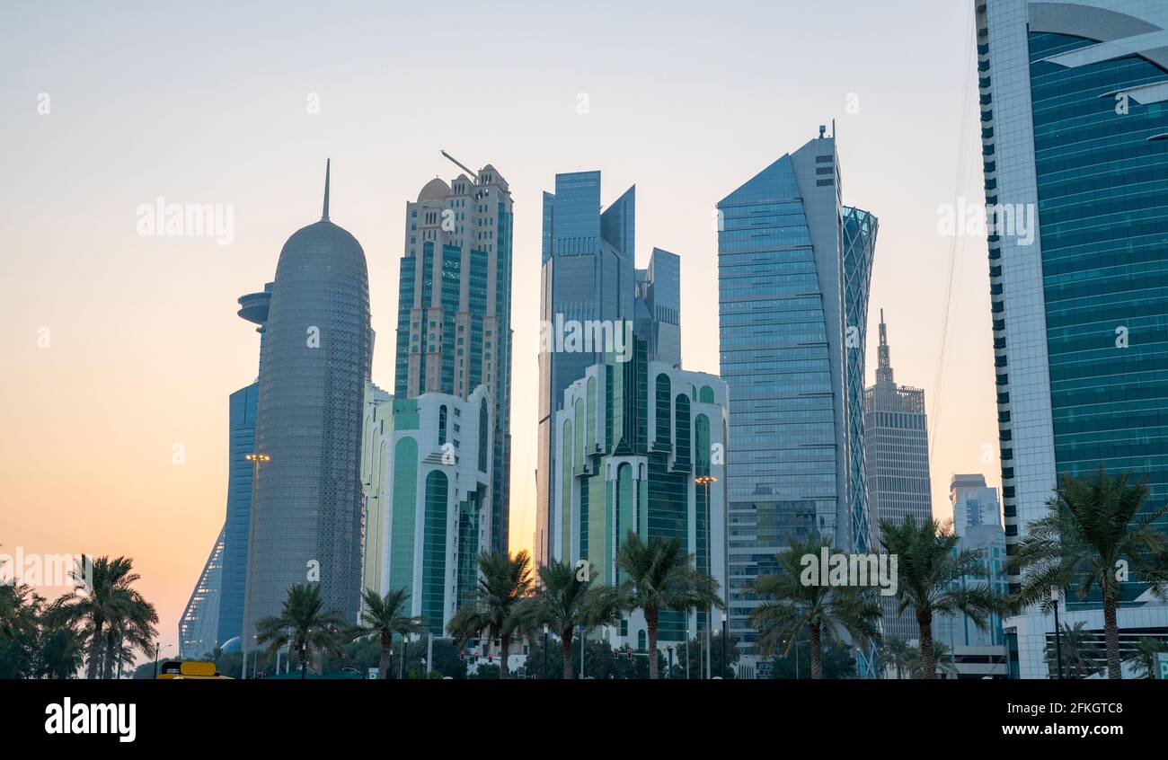 Colorful Skyline of Doha Qatar City during night during winter season ...