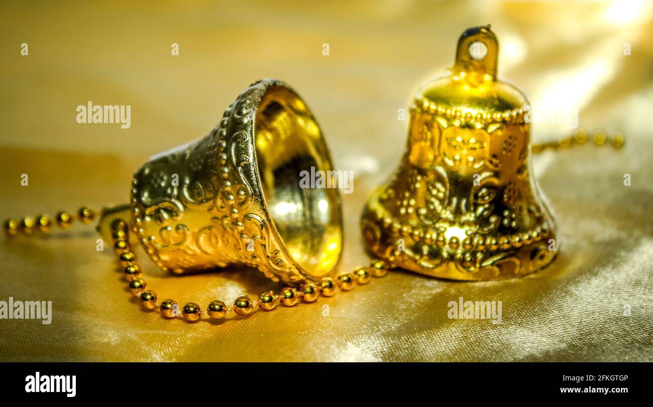 Gold bells hi-res stock photography and images - Alamy
