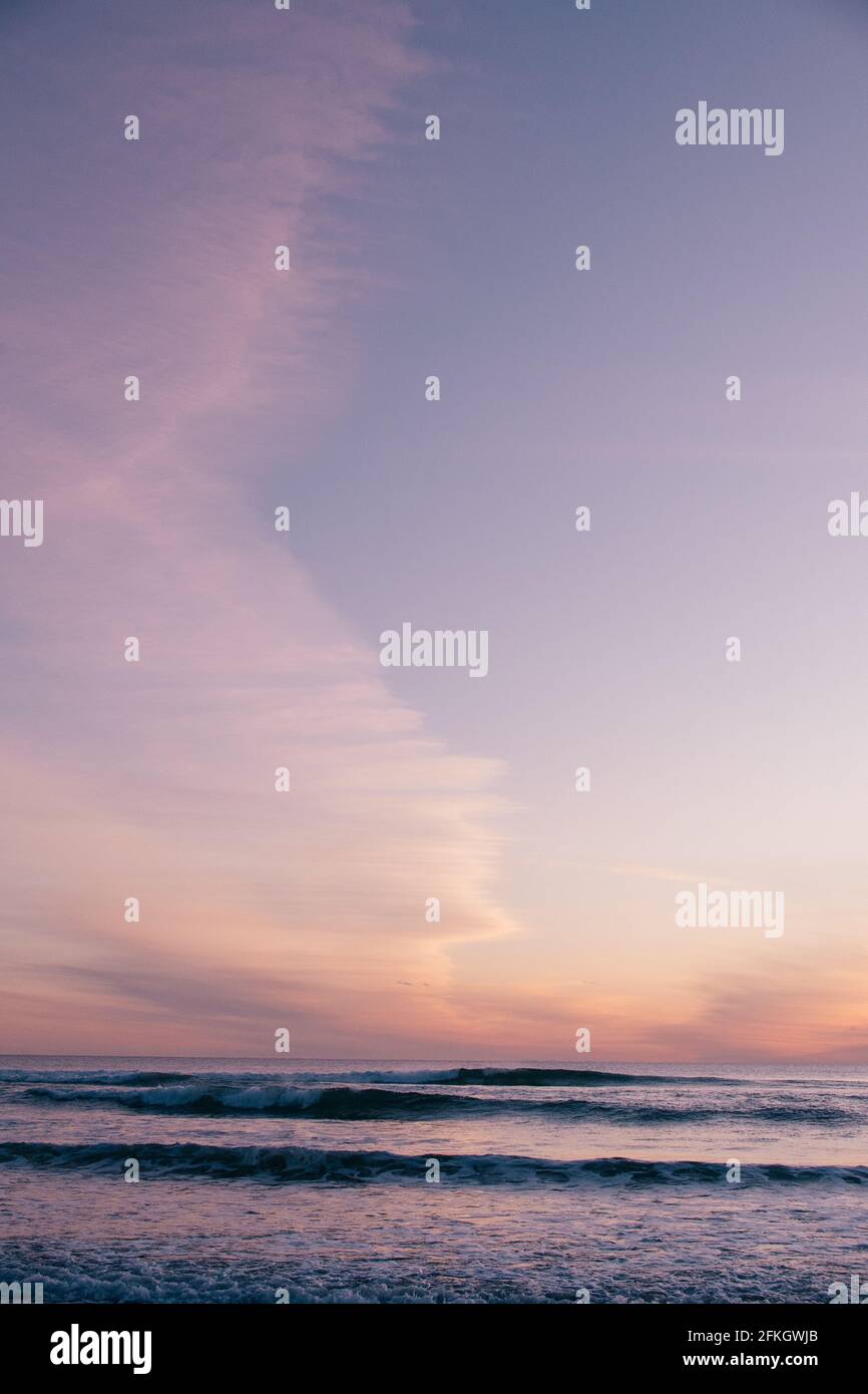 Soft pink sunset skies hi-res stock photography and images - Alamy