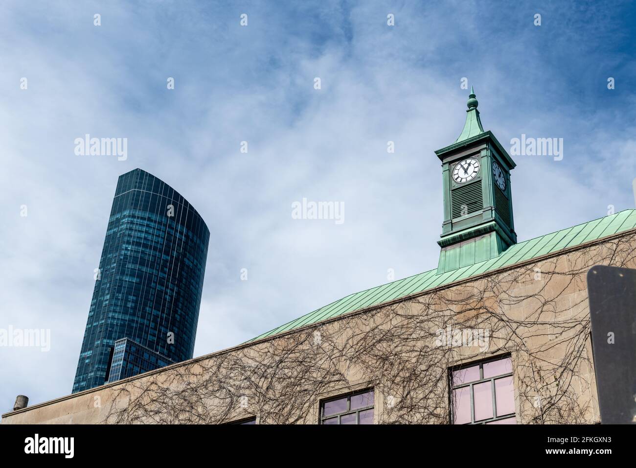 Old vs. new architectural contrast. In the foreground and old building ...