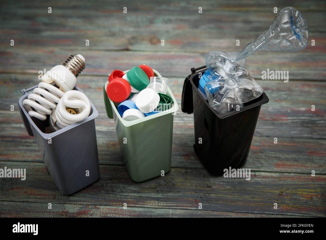 Ecology concept, a lot of recyclable objects in containers on the ...