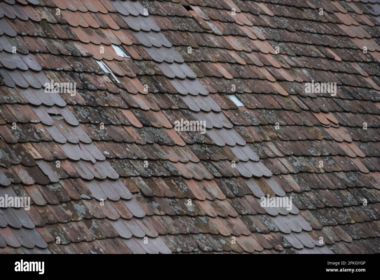 Texture of an old weathered tile roof Stock Photo - Alamy