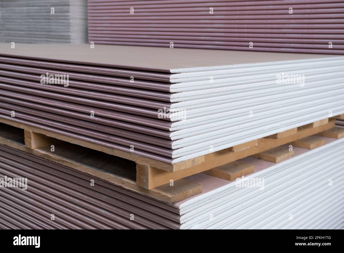 The stack of Plasterboard fire-resistant gypsum board cardboard surface ...
