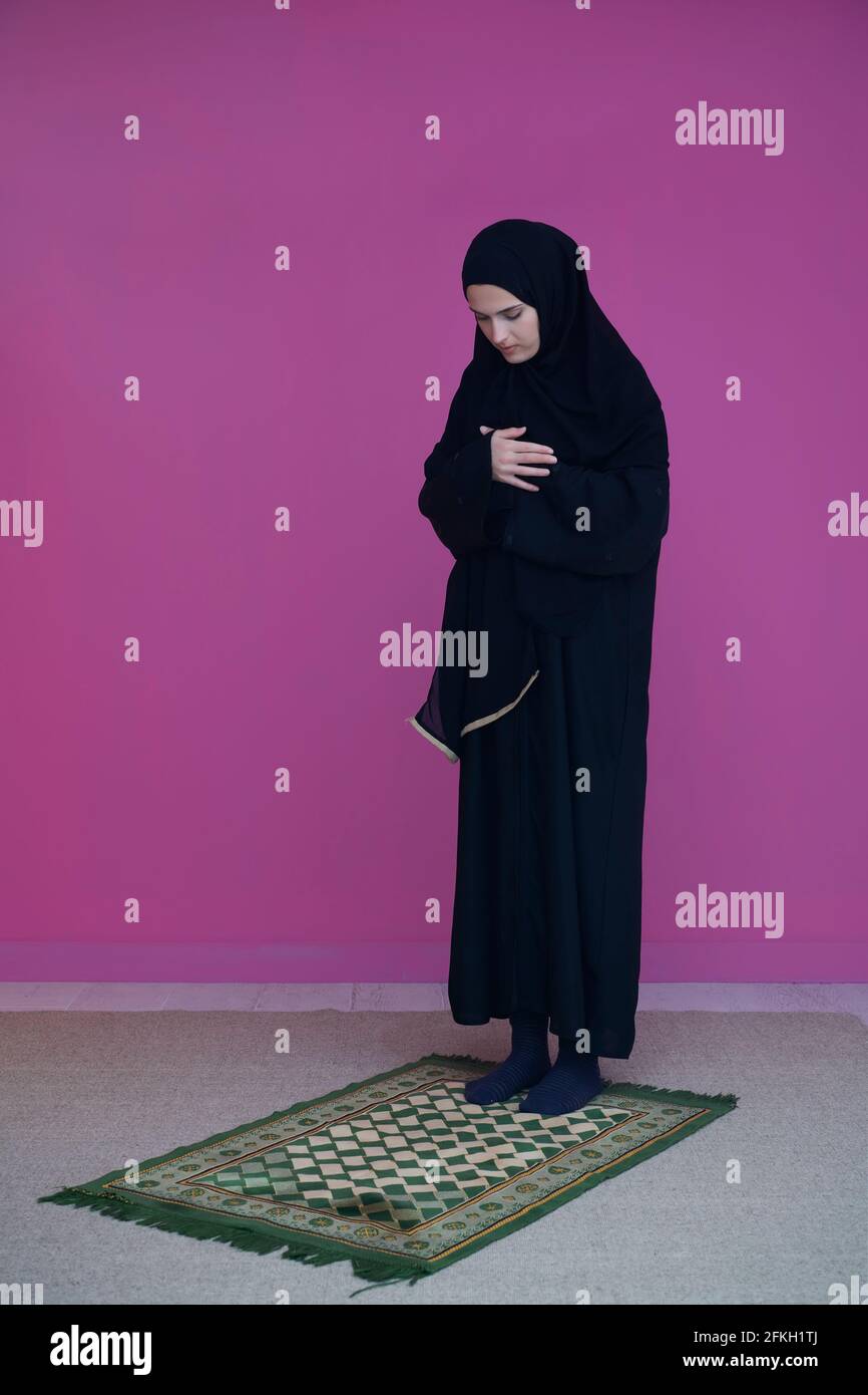 Muslim woman in namaz praying to Allah Stock Photo - Alamy