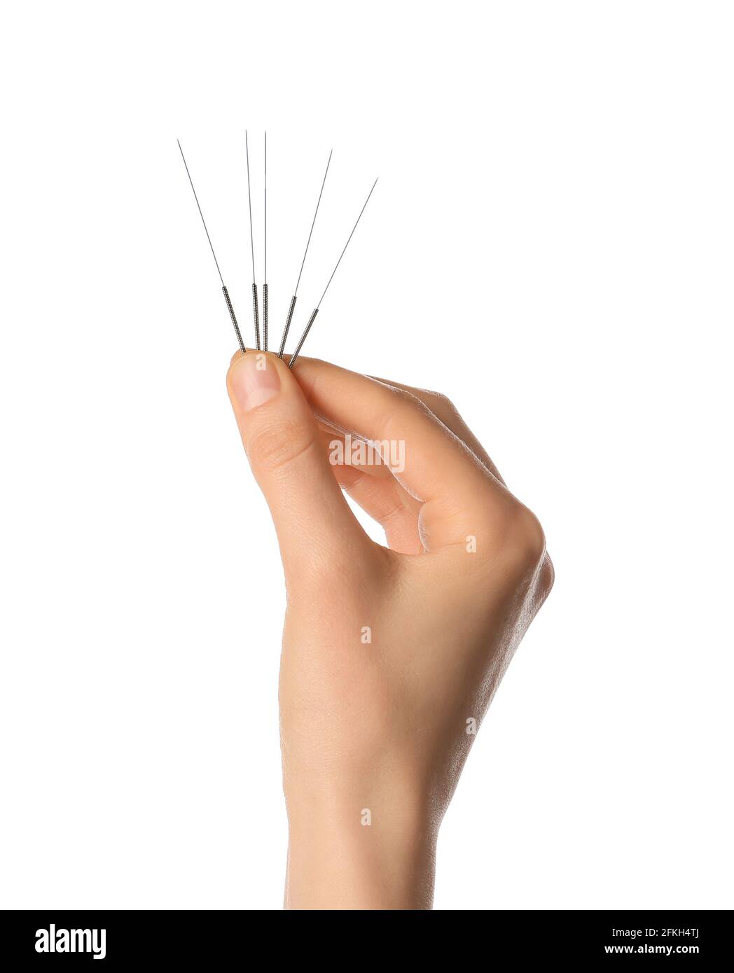 Hand with acupuncture needles on white background Stock Photo - Alamy