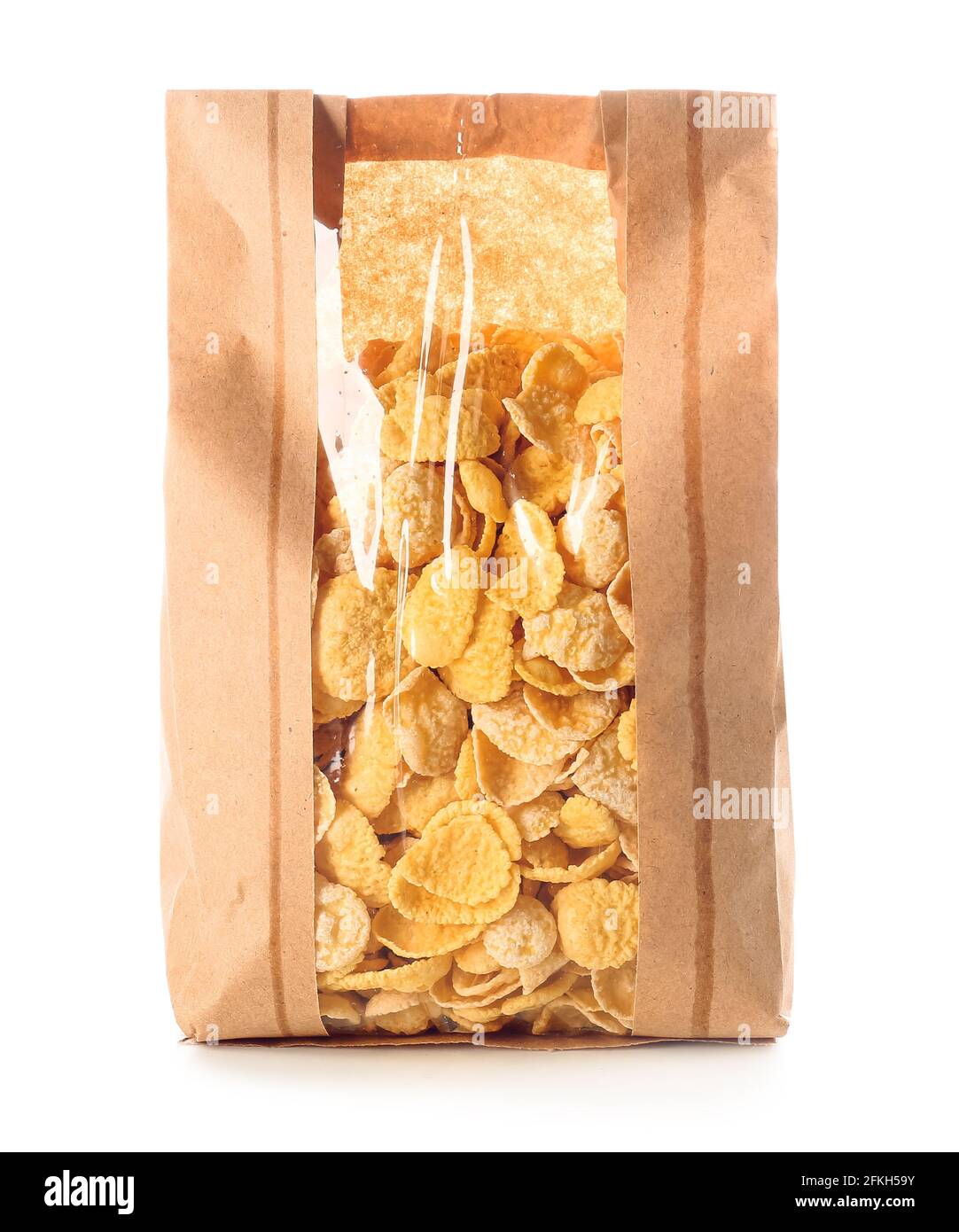 Bag with tasty cornflakes on white background Stock Photo - Alamy