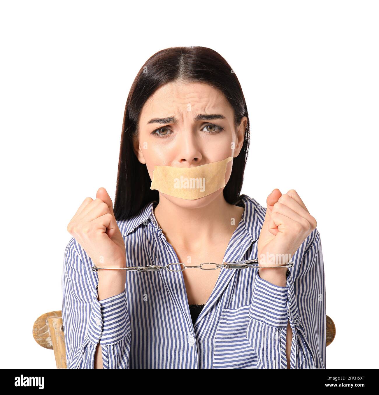 Female hostage on white background Stock Photo - Alamy