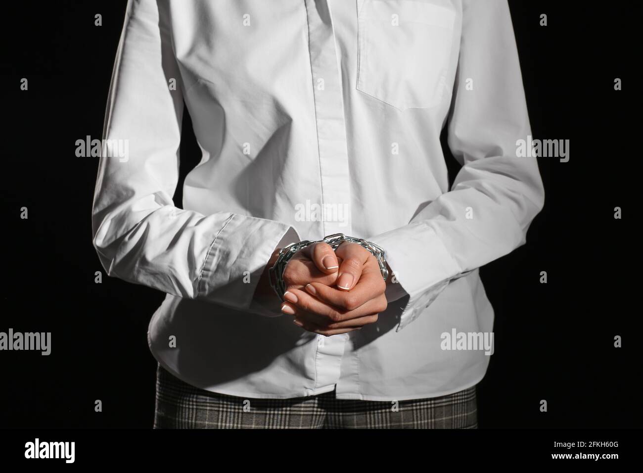 Female hostage on dark background Stock Photo - Alamy