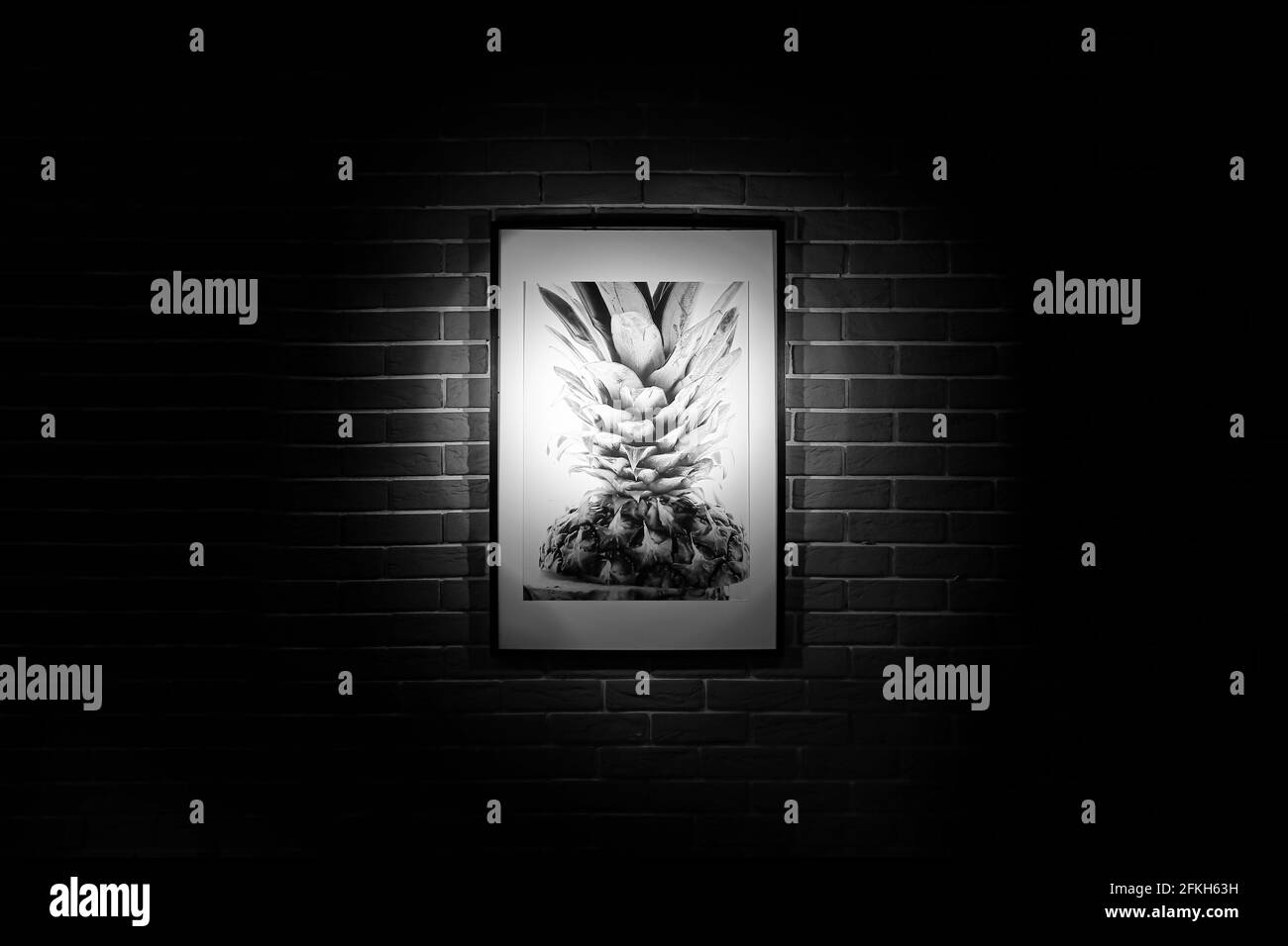 Picture near brick wall in gallery Stock Photo - Alamy