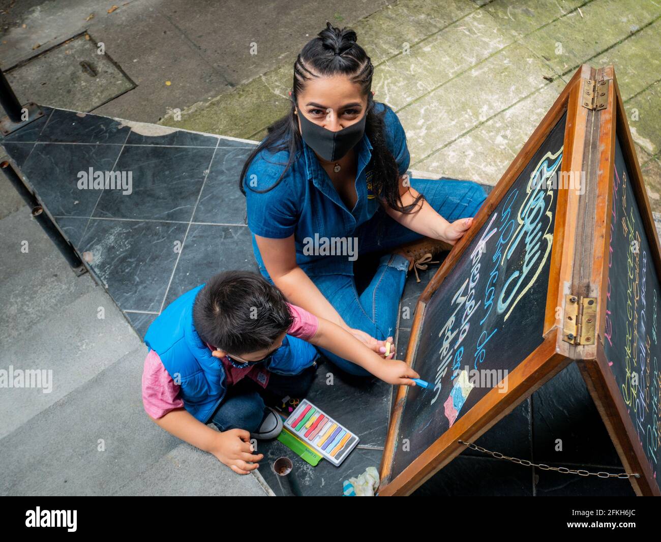 Medellin, Colombia - March 28 2021: A Latin Woman Writing on a ...
