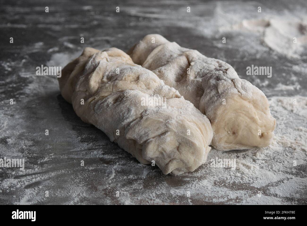 Two Flour Dough Resting on a Metal Table Stock Photo - Alamy