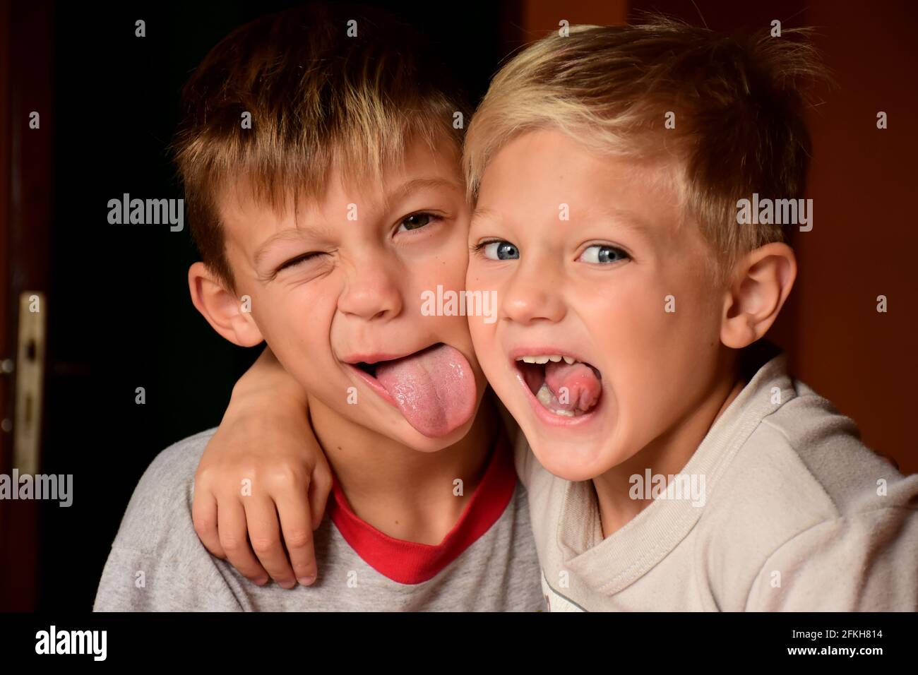 The cute young Caucasian boys posing with a wacky face Stock Photo - Alamy