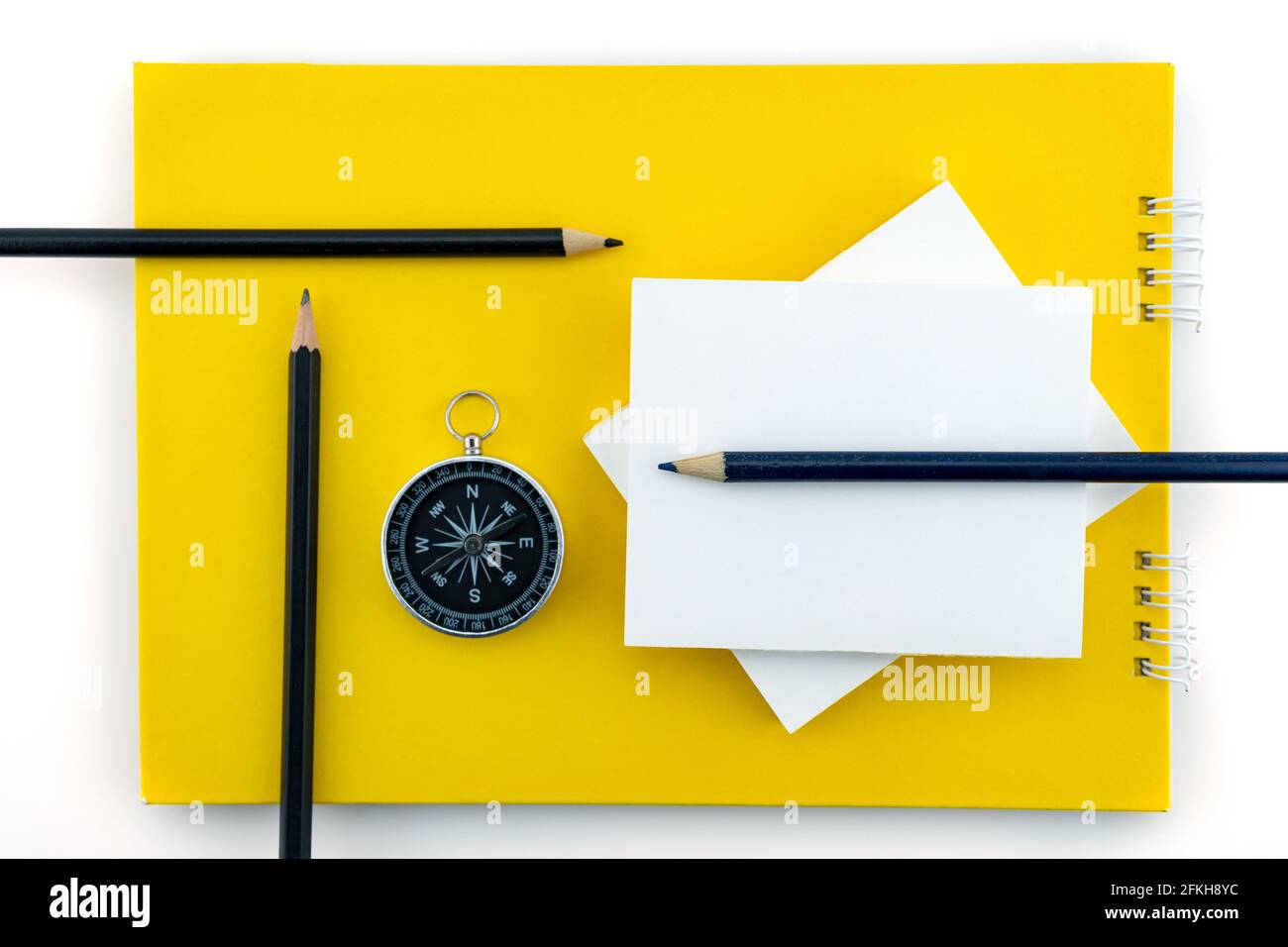 Top view business objects of white paper,pencil,and compass on paper ...
