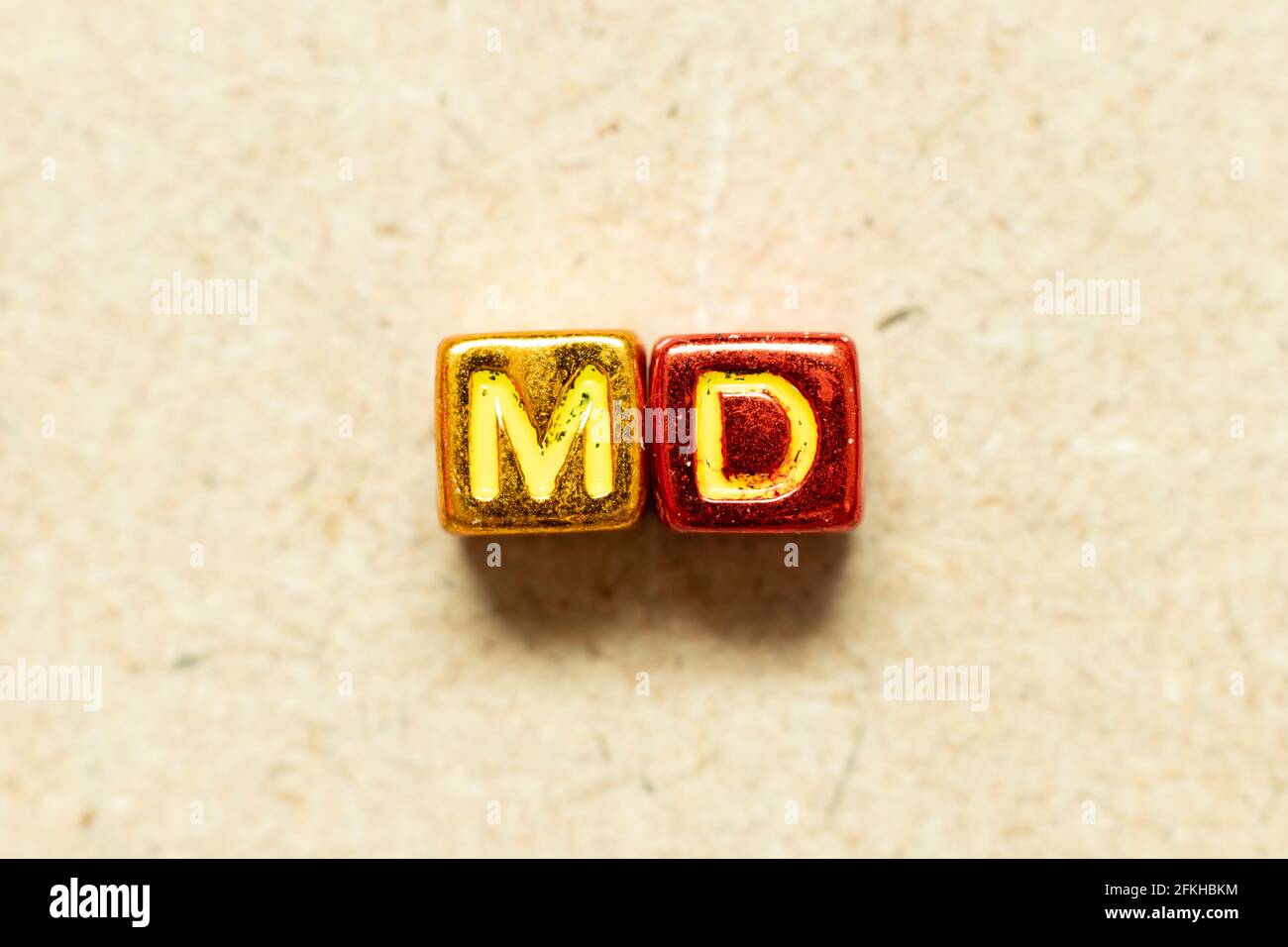Metallic color alphabet letter block in word MD (abbreviation of doctor ...