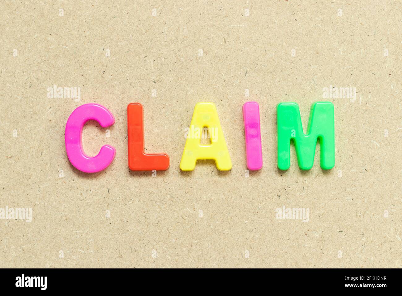 Color alphabet letter with word claim on wood background Stock Photo ...