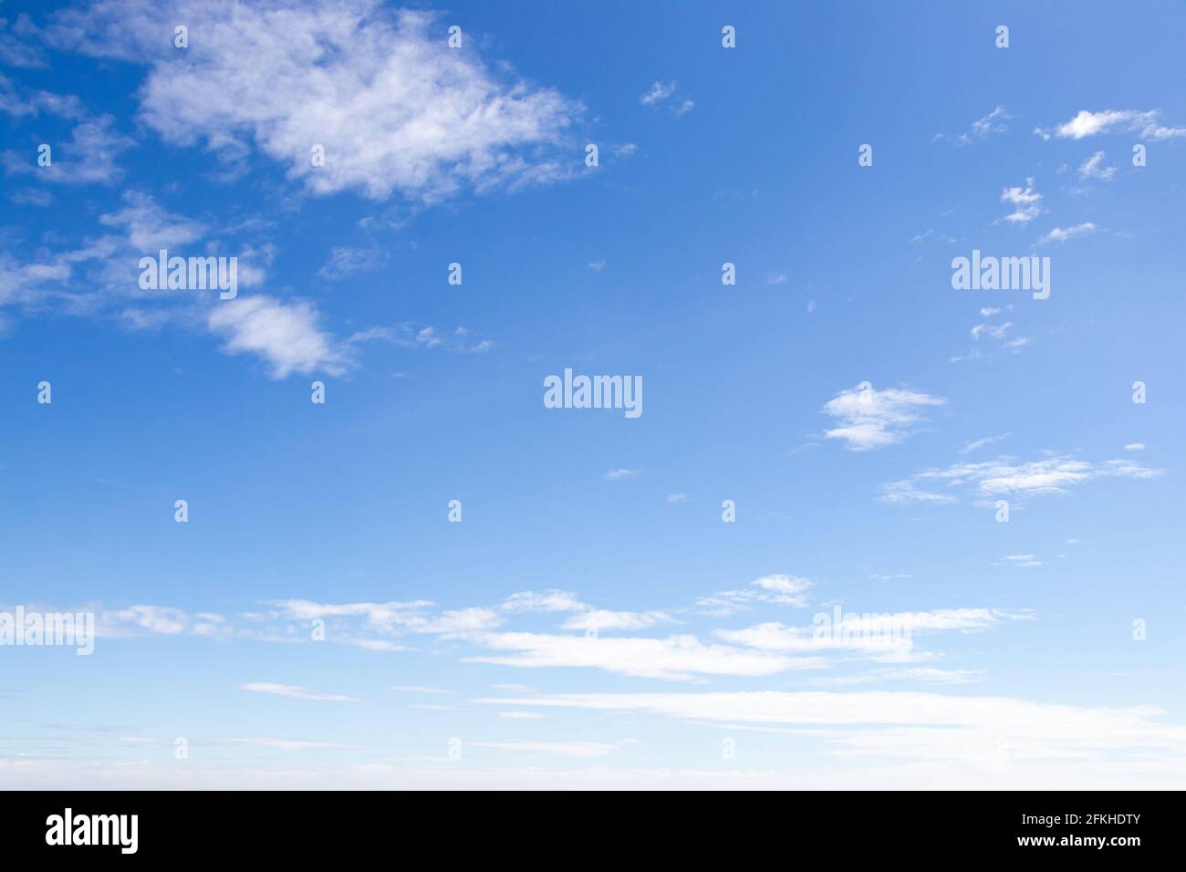 Clear blue color sky with white cloud background Stock Photo - Alamy