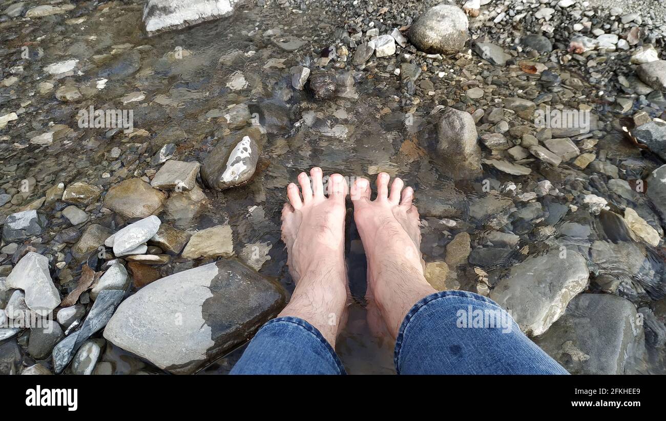 Legs in water relax hi-res stock photography and images - Alamy