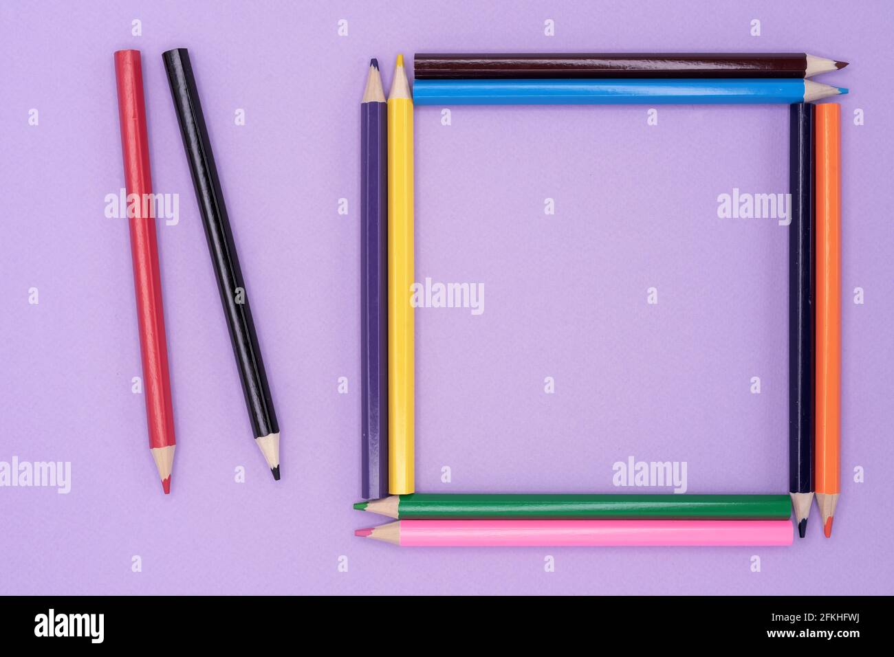 Frame of colored pencils for drawing on a lilac background Stock Photo ...
