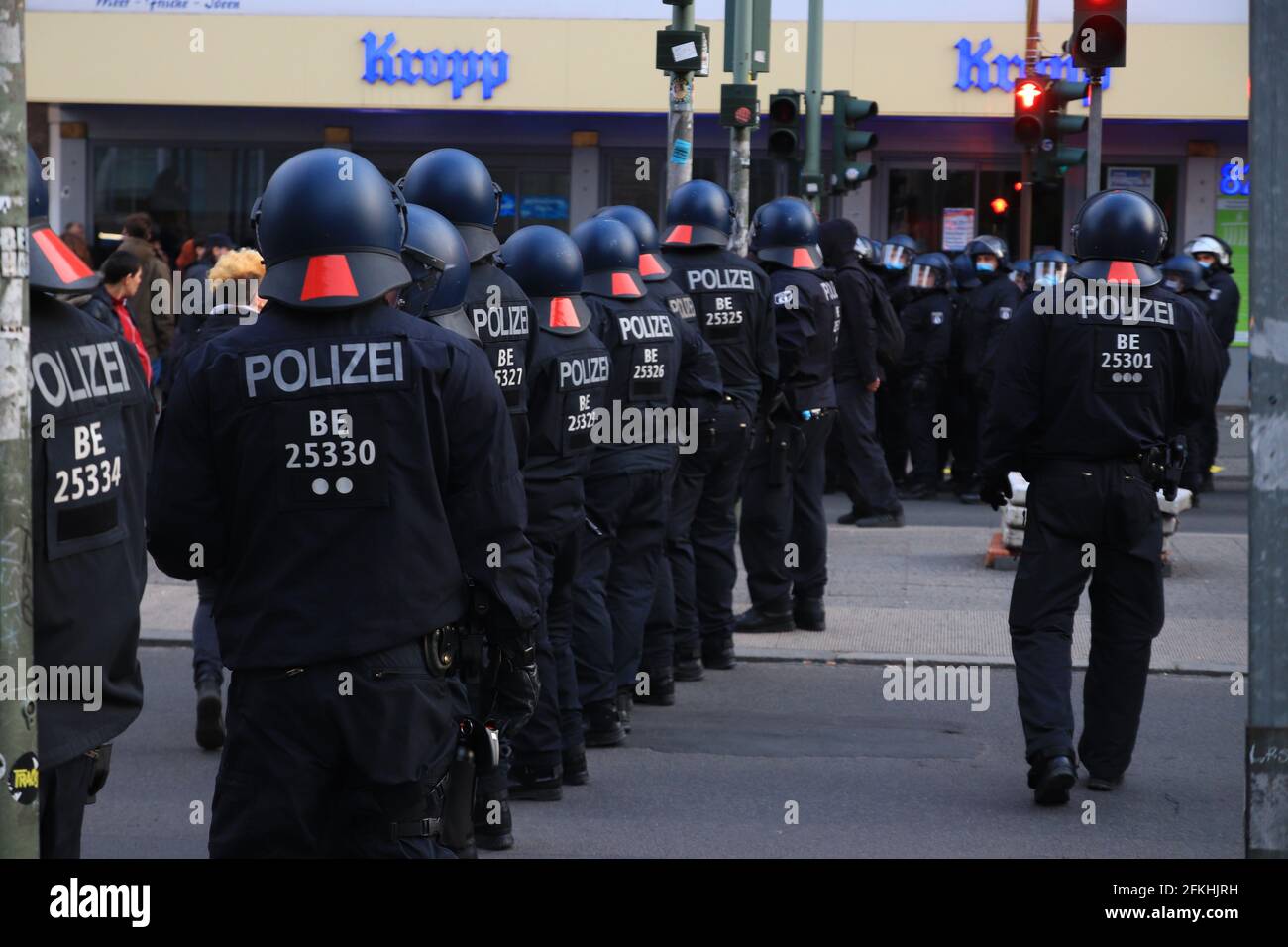 Crowded safety helmet uniform protest hi-res stock photography and ...