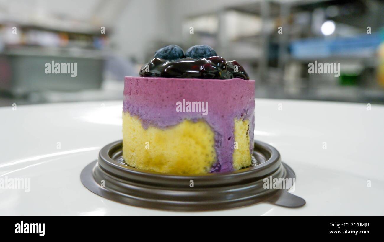 A blueberry dessert on top blue filling Stock Photo - Alamy