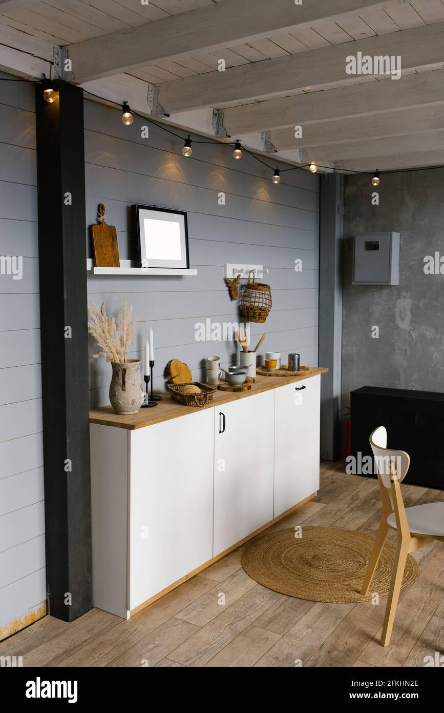 Scandinavian stylish white kitchen in a country house Stock Photo - Alamy