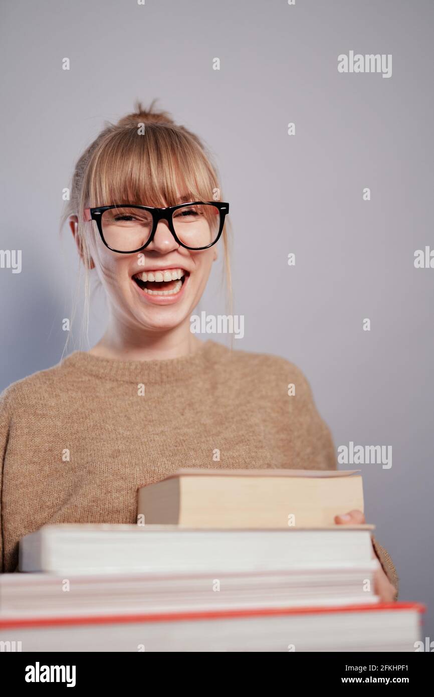 Attractive laughing positive nerd, attractive university or college ...