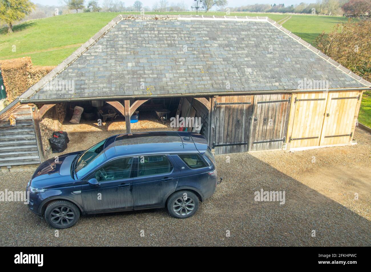 high side view of Land Rover Discovery in farm yard Stock Photo - Alamy