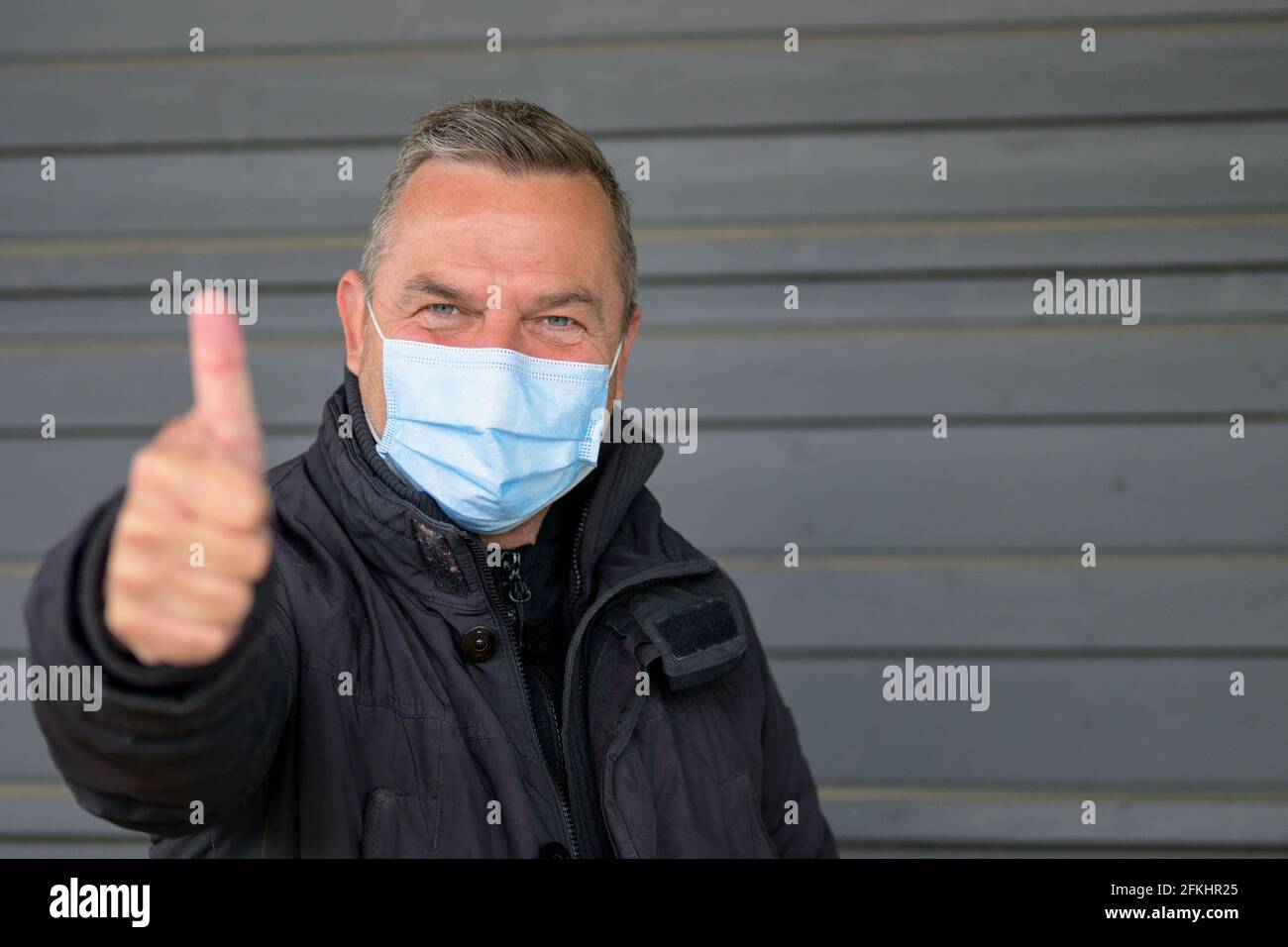 Smiling mask frowning face hi-res stock photography and images - Alamy