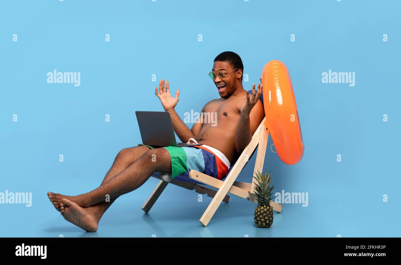Man chilling in swimming pool hi-res stock photography and images - Alamy